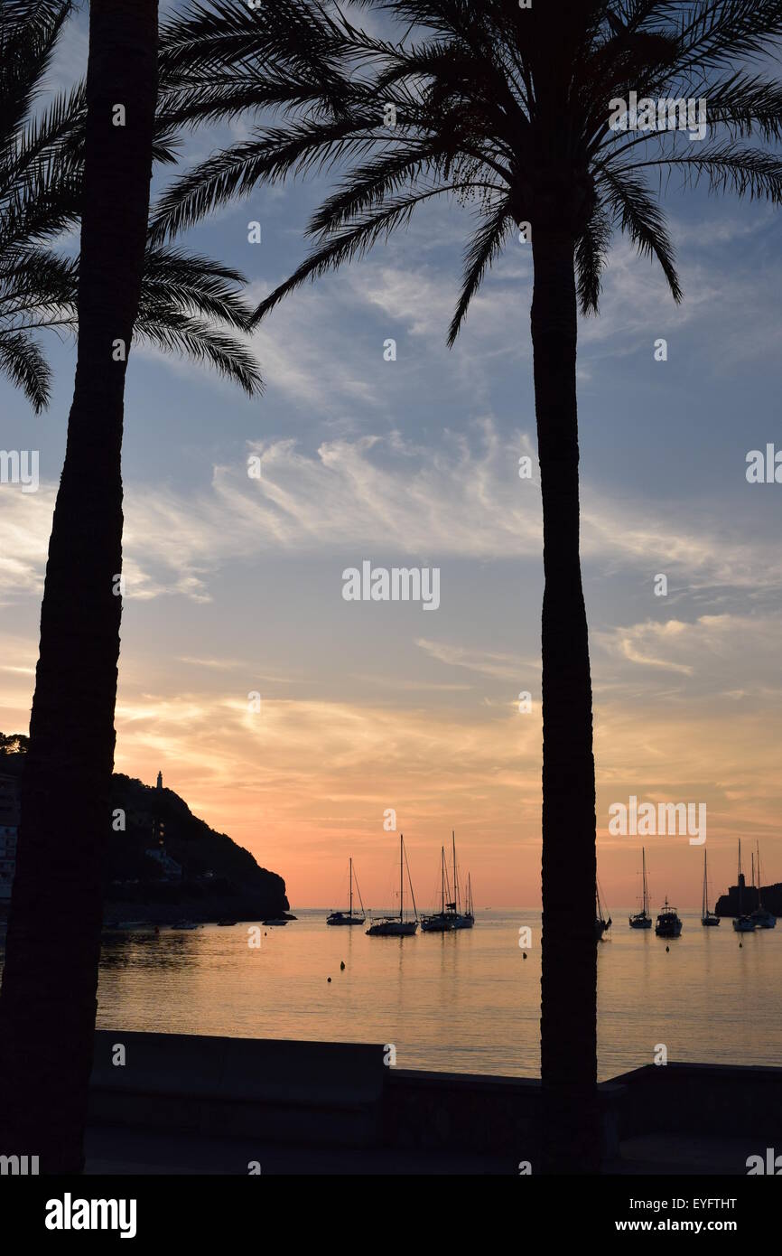 Sunset over the natural harbor of Port de Soller on Majorca, Spain ...