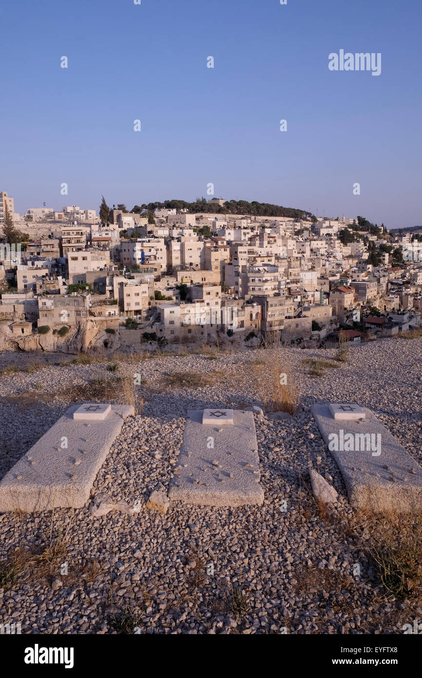 View of old Jewish Tombs and the Palestinian neighborhood of Silwan or ...