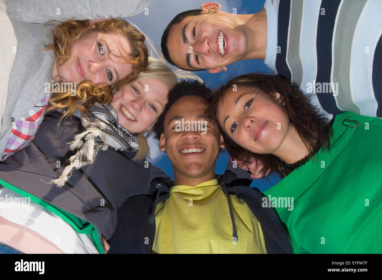 Girls in huddle looking at camera hi-res stock photography and images ...