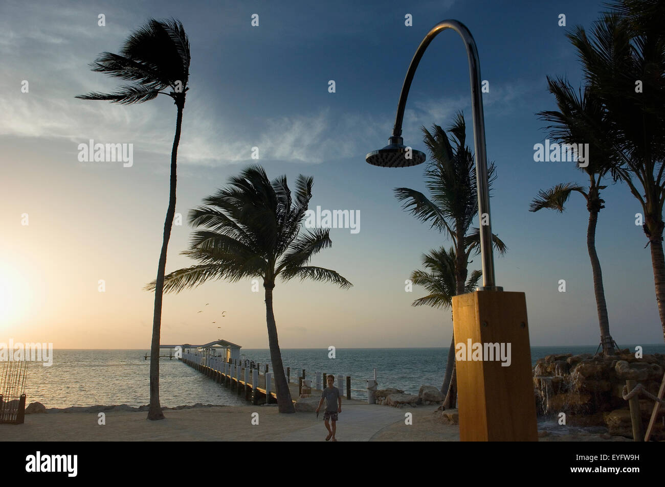USA, Florida, Florida Keys, Sunrise over pier and boat dock at ...