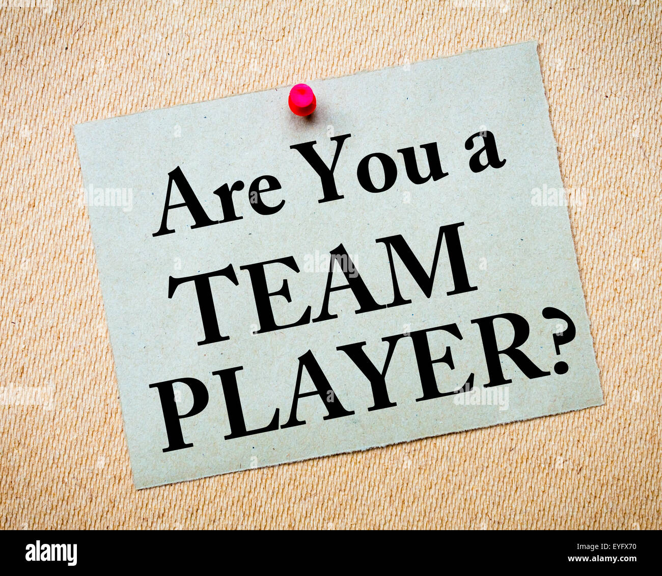 Are You A Team Player? message written on recycled paper note pinned on ...