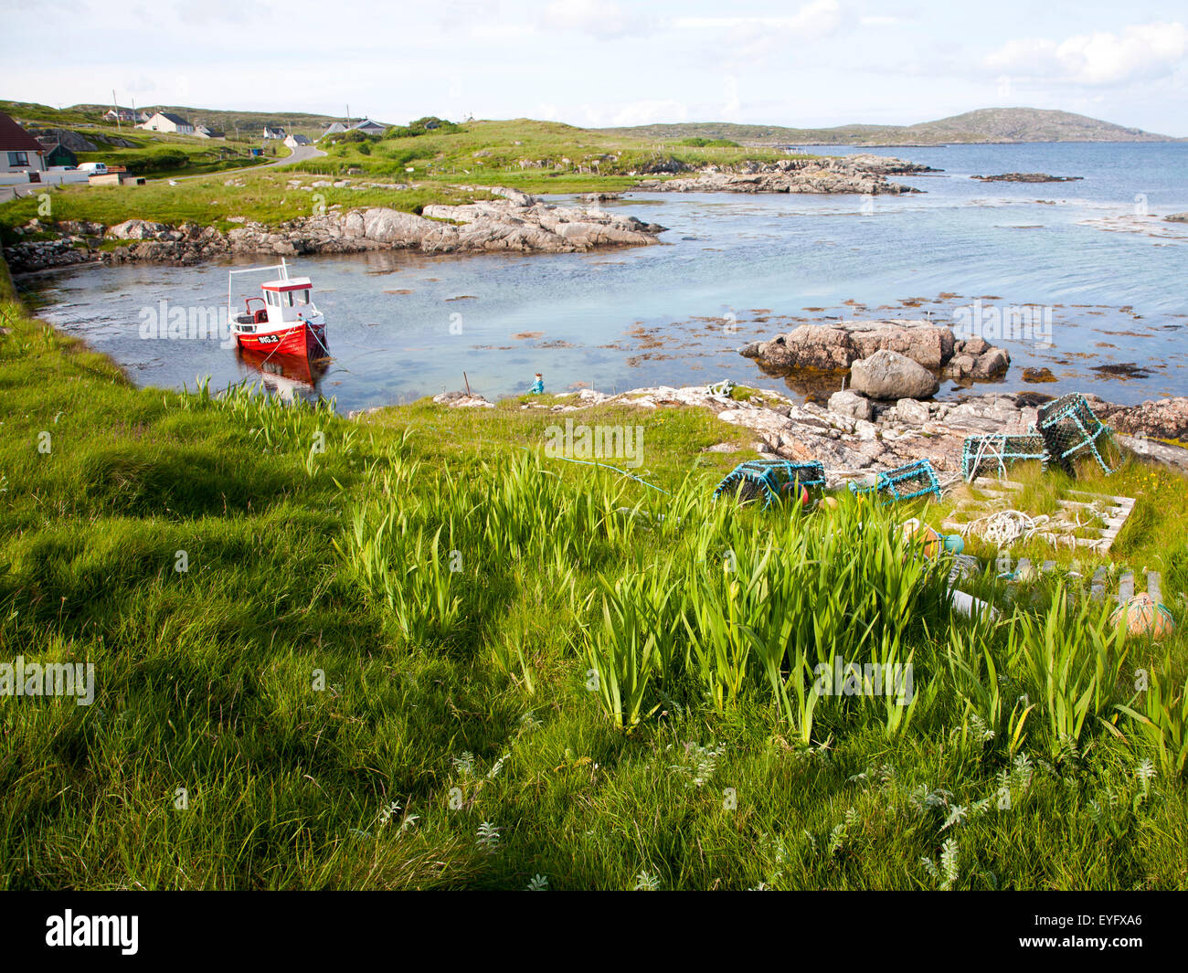 Small fishing boat at moorings on the east coast of Barra, Outer ...