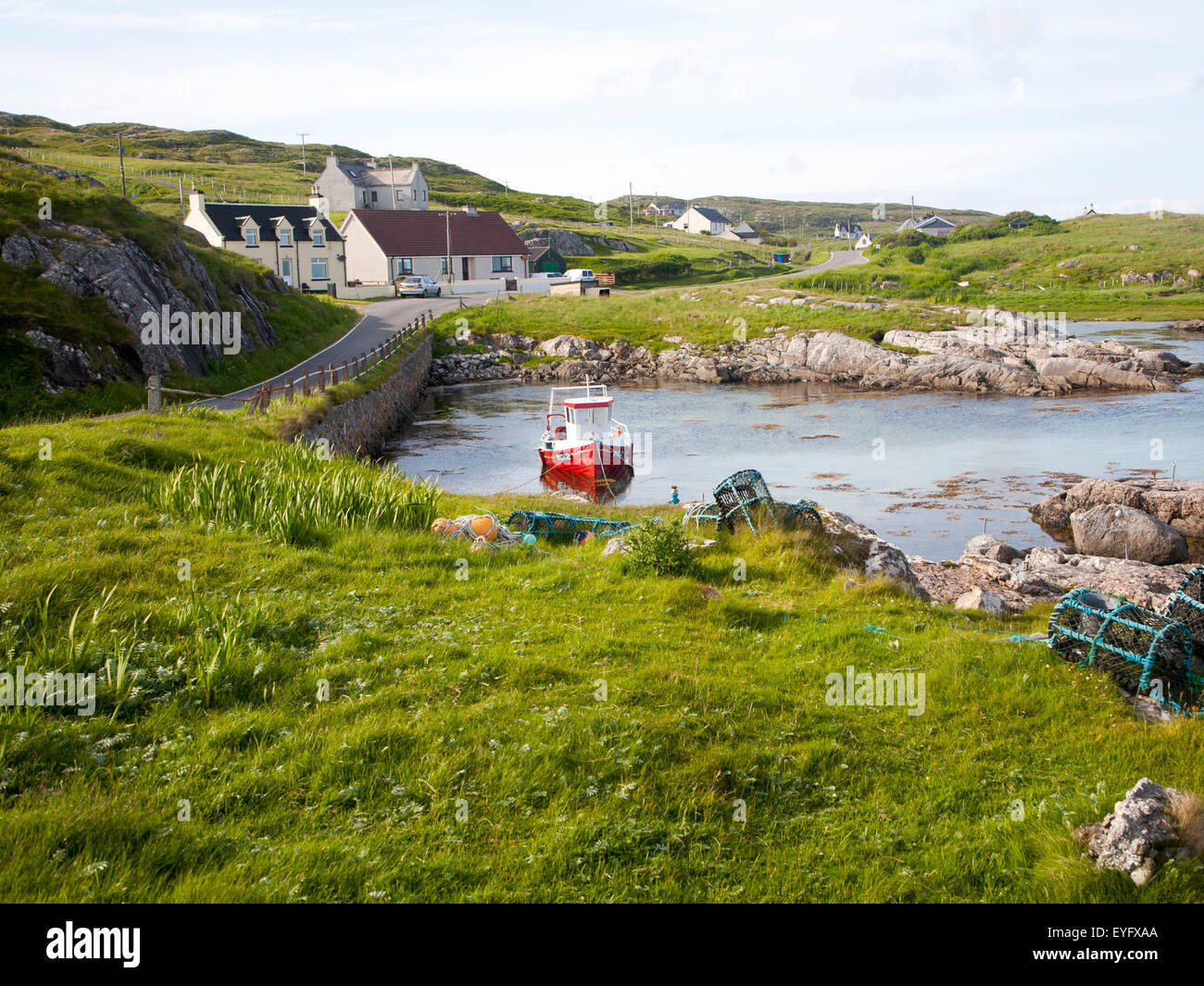Small fishing boat on the east coast of barra hi-res stock photography ...
