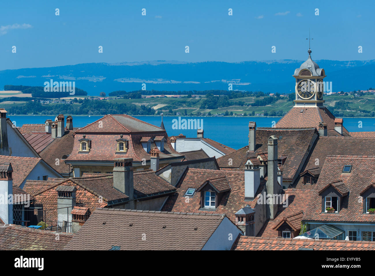 View onto roofs of the historic centre, Lake Morat behind, Murten or ...