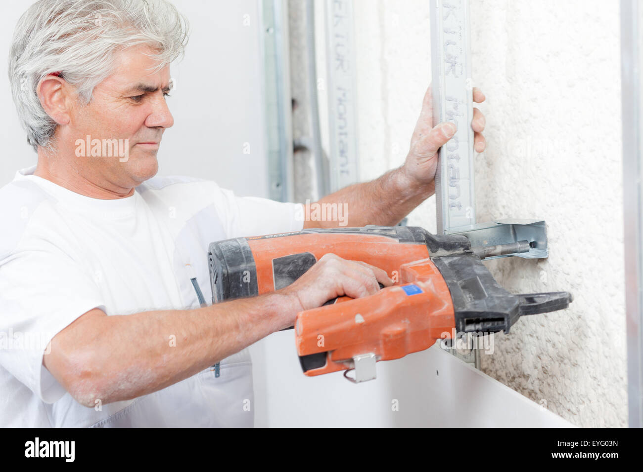 Pneumatic nail gun hi-res stock photography and images - Alamy