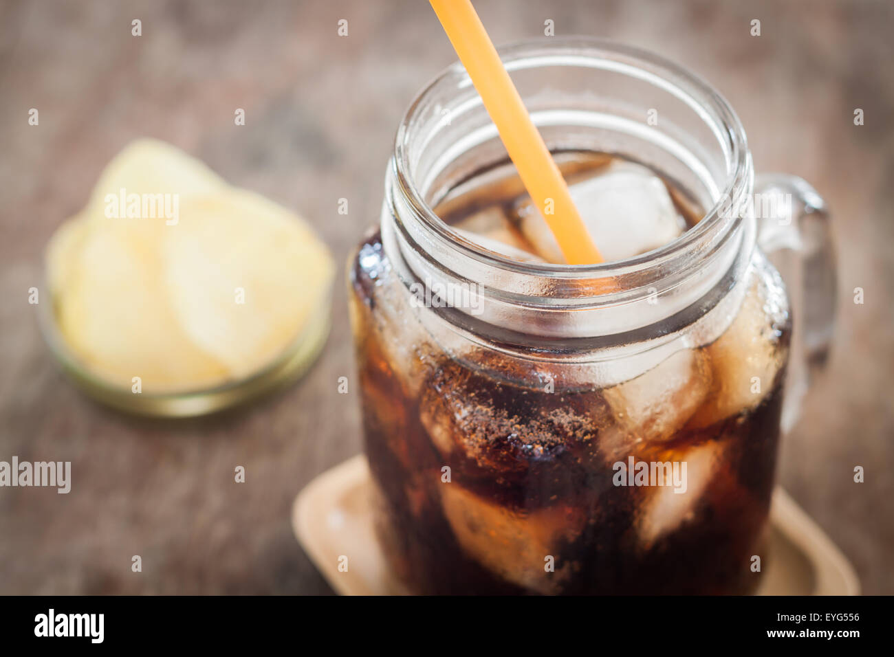 Iced cola with potato chips, stock photo Stock Photo - Alamy
