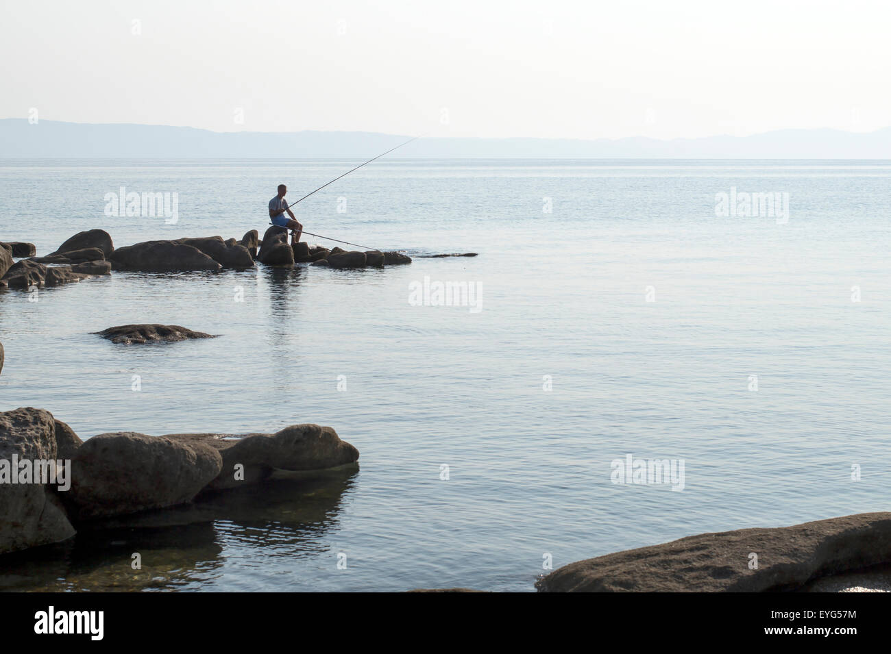 Fisherman at sea rough hi-res stock photography and images - Alamy