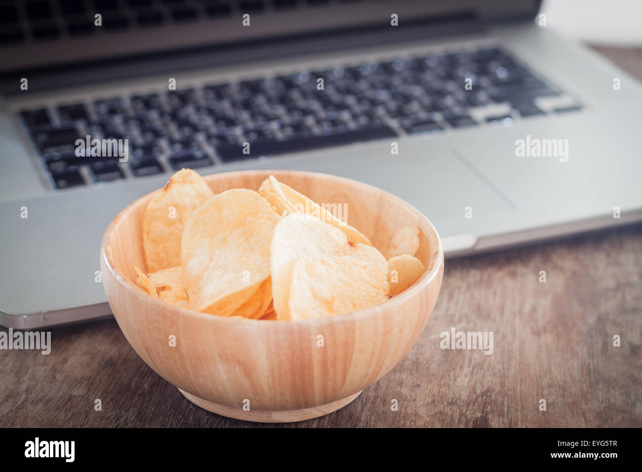 Crispy potato chips on work station, stock photo Stock Photo - Alamy