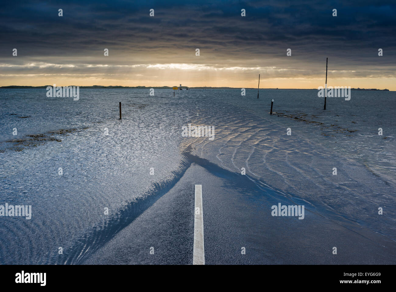 Holy Island's road causeway and receding tidal water, Northumberland ...