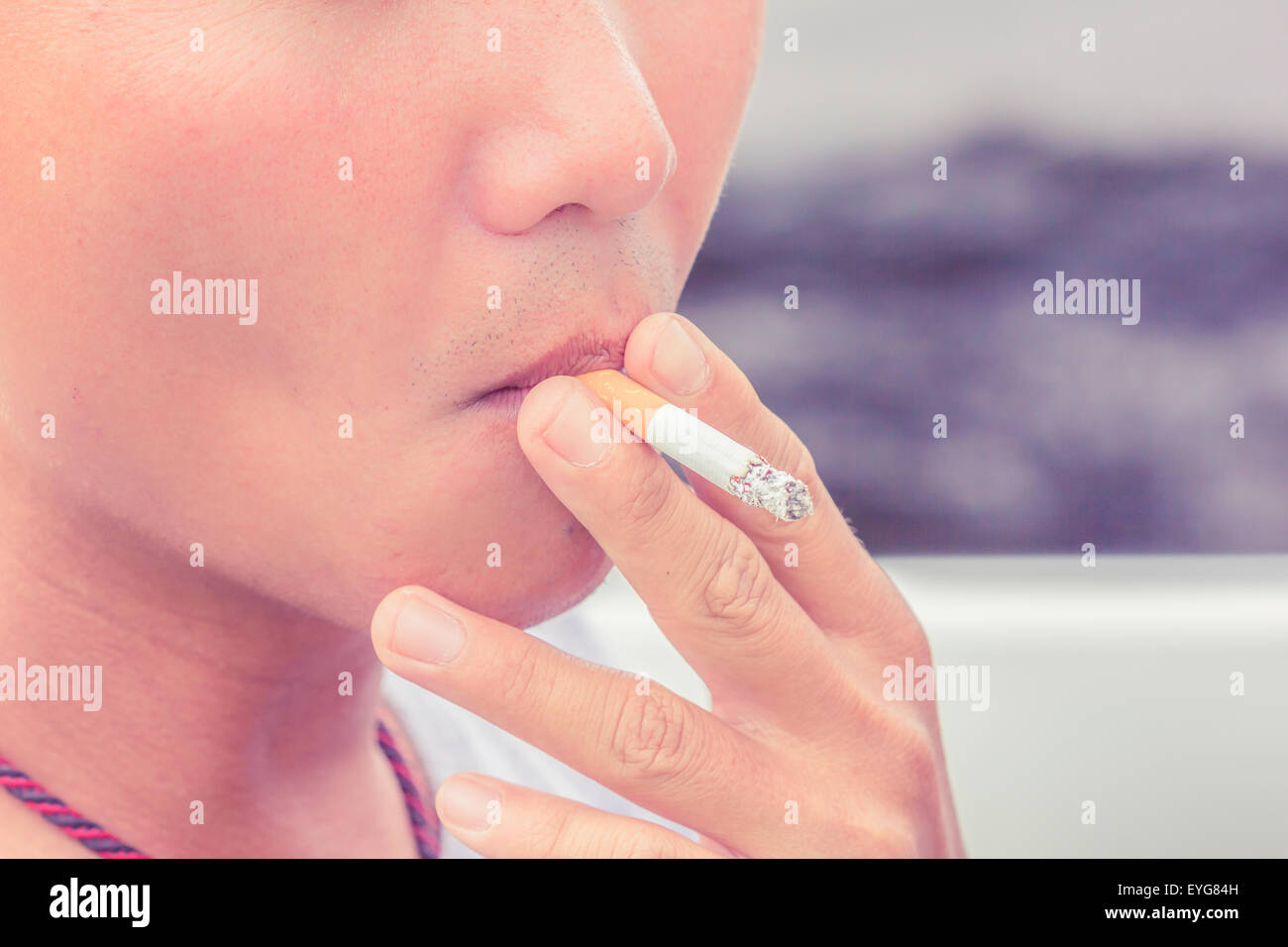 Vintage cigarette smoking hi-res stock photography and images - Alamy