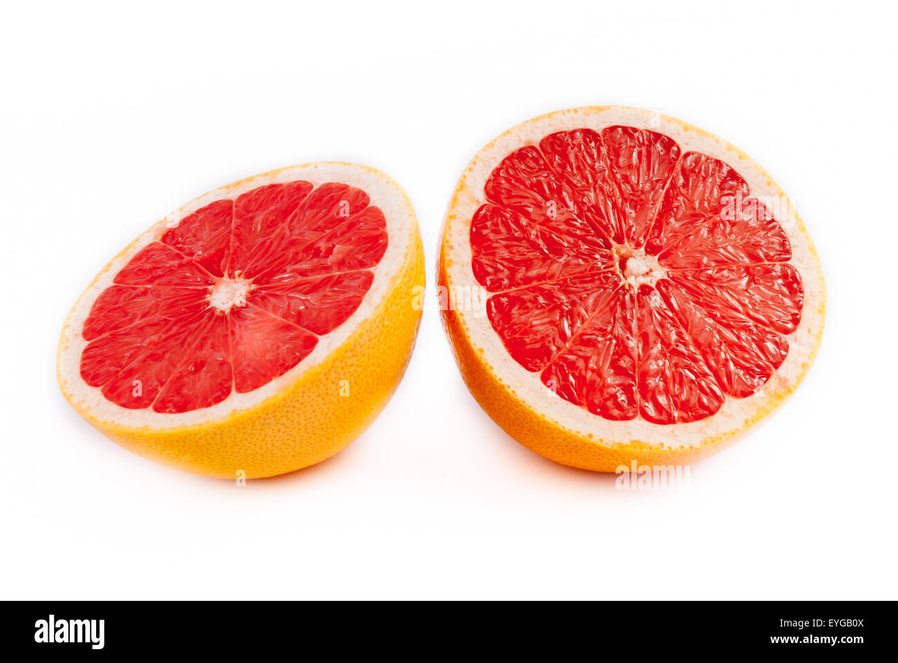 Grapefruit cut in half isolated on white background Stock Photo - Alamy