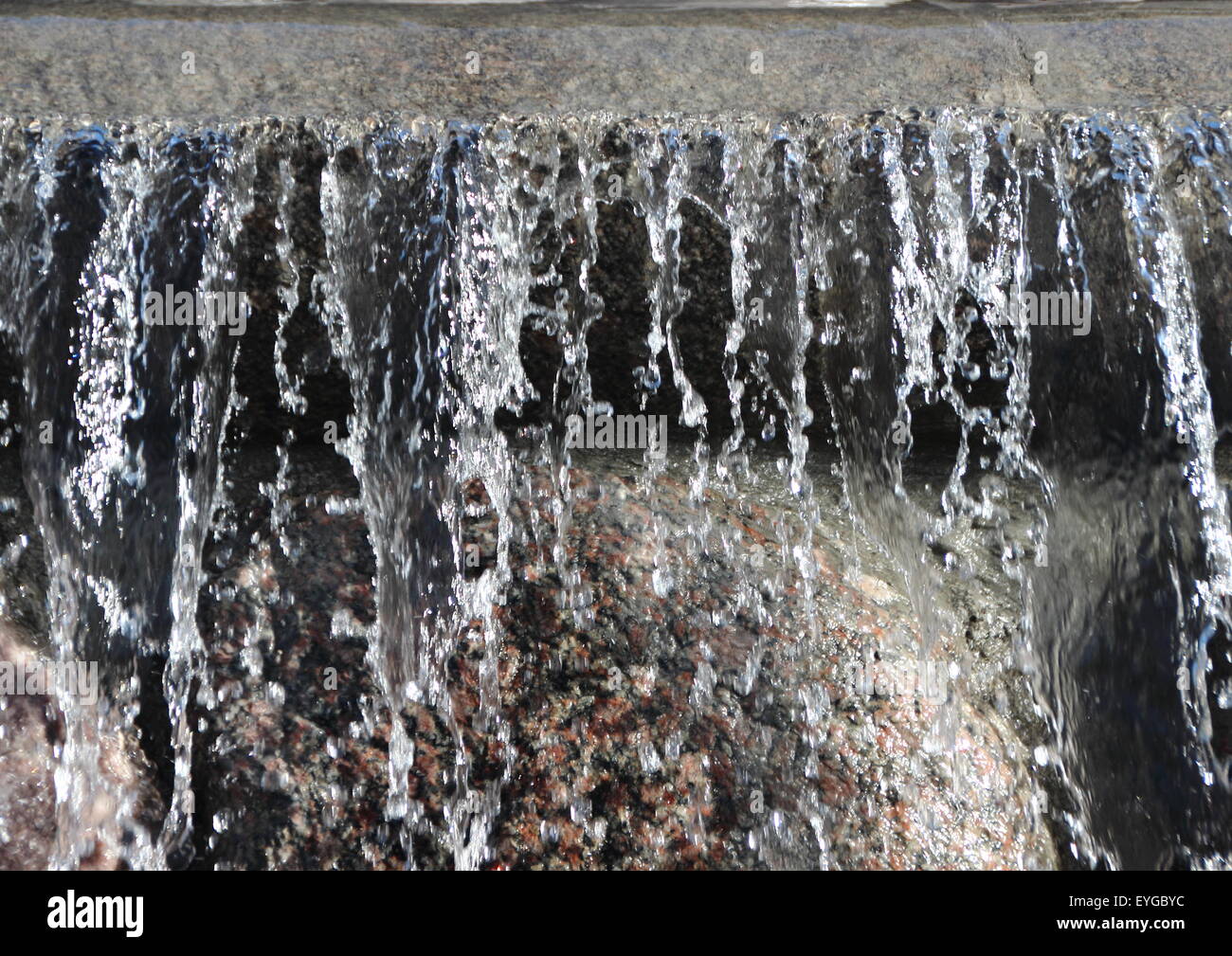 Isolated Waterfall from Flooded Rock Urban Fountain Background Stock ...