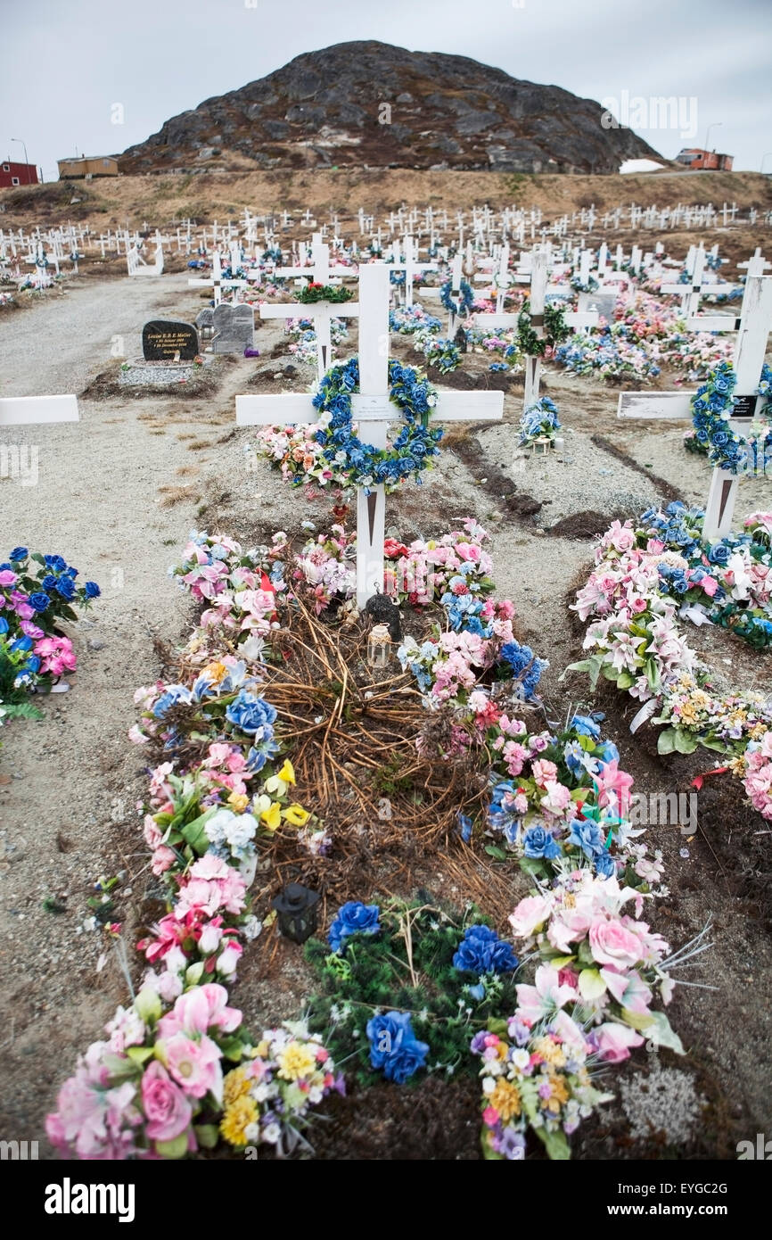 Denmark, Greenland, Flowers on grave in cemetery; Paamiut Stock Photo ...