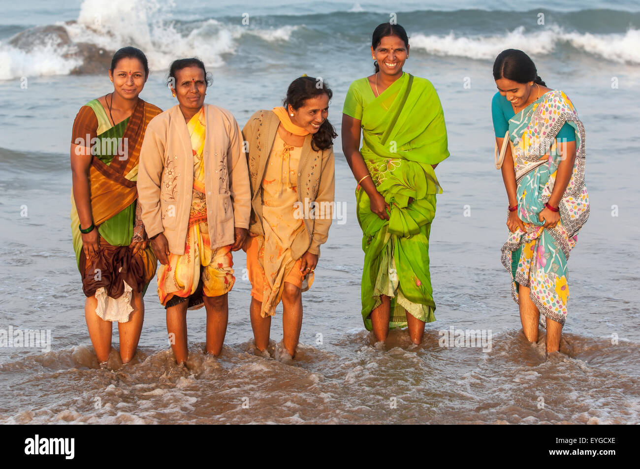 India, Karnataka, Group Of Indian Women Posing Ankle Deep In Water ...