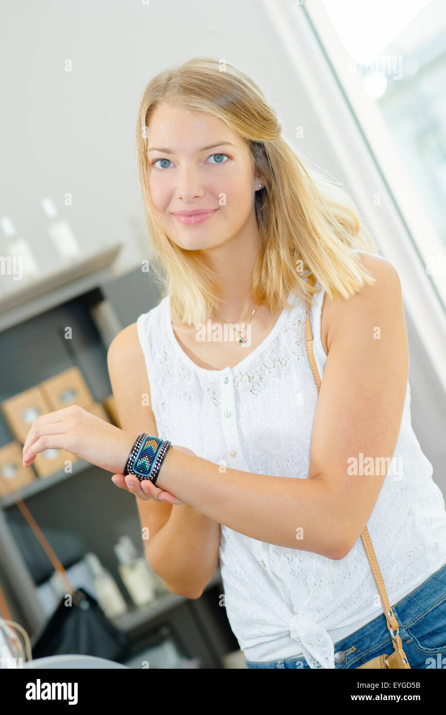 Girl modeling bracelet Stock Photo - Alamy
