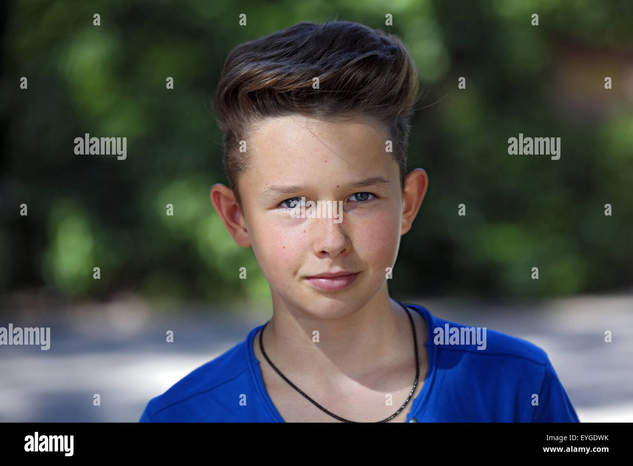 Berlin, Germany, Boy looks relaxed in the camera Stock Photo - Alamy