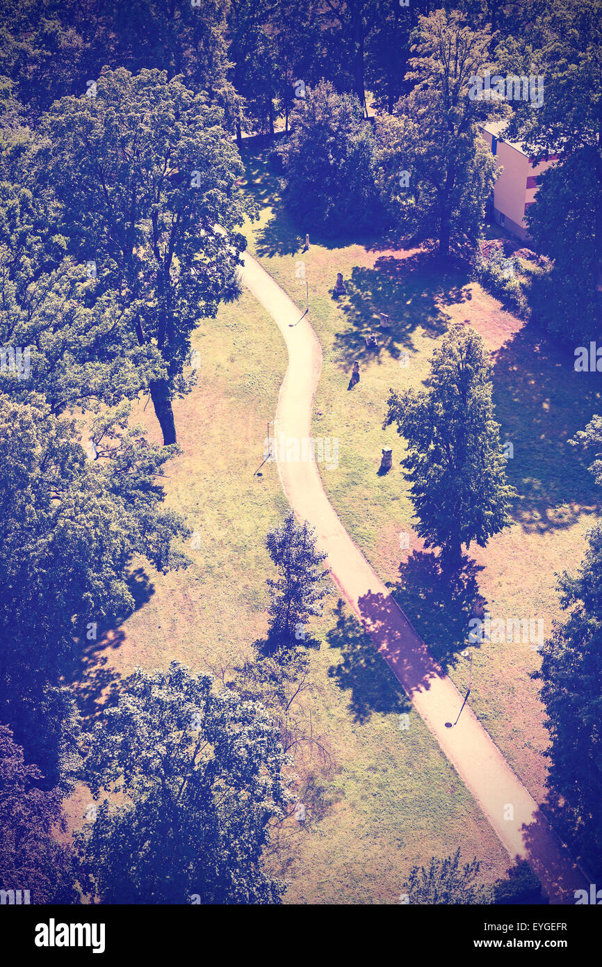 Vintage instagram style bright path in dark park, abstract background ...
