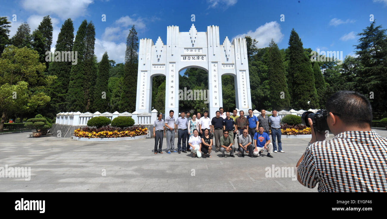 Huaihua, China's Hunan Province. 29th July, 2015. People pose for a ...