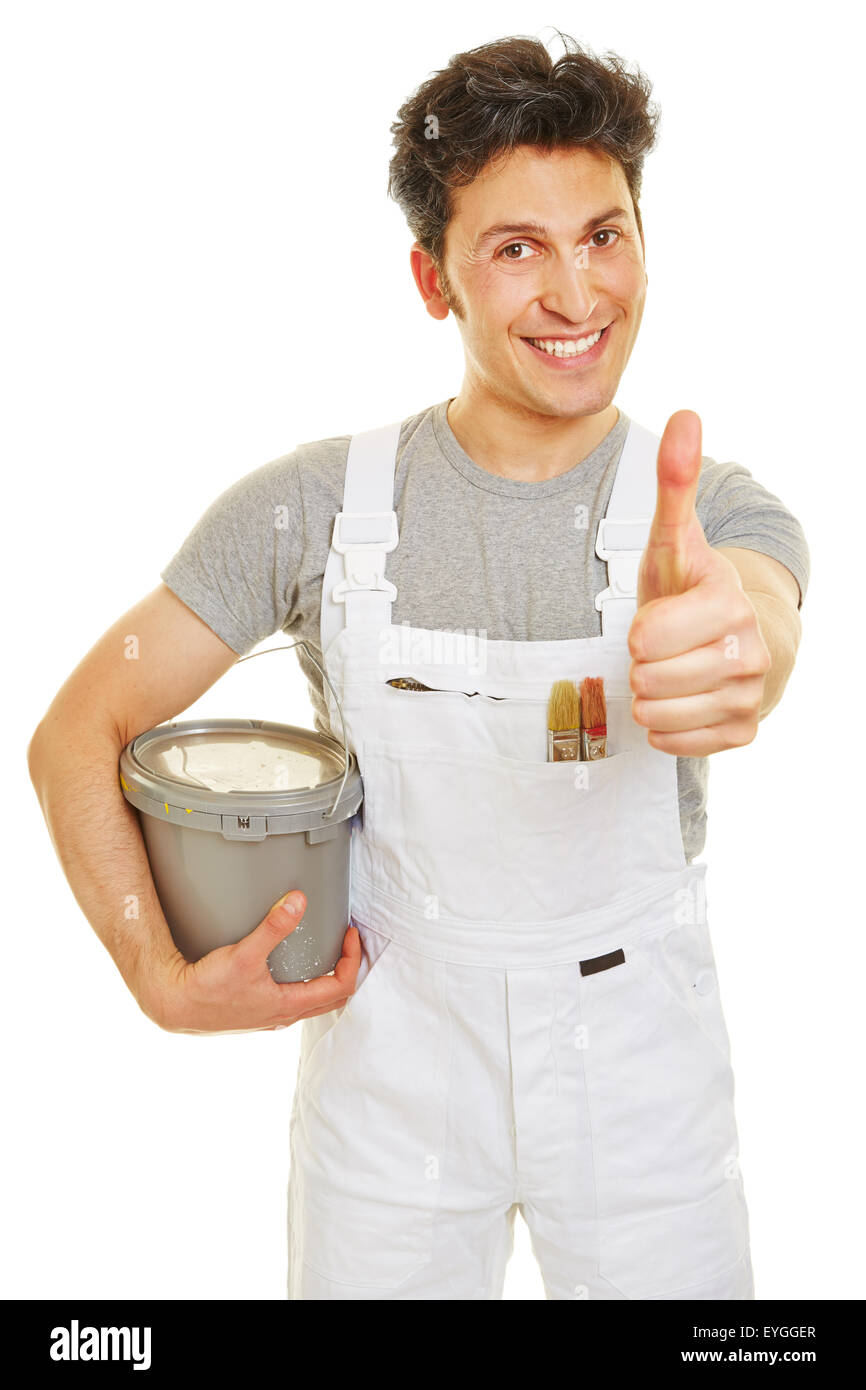 Smiling painter with paint bucket holding his thumb up Stock Photo - Alamy
