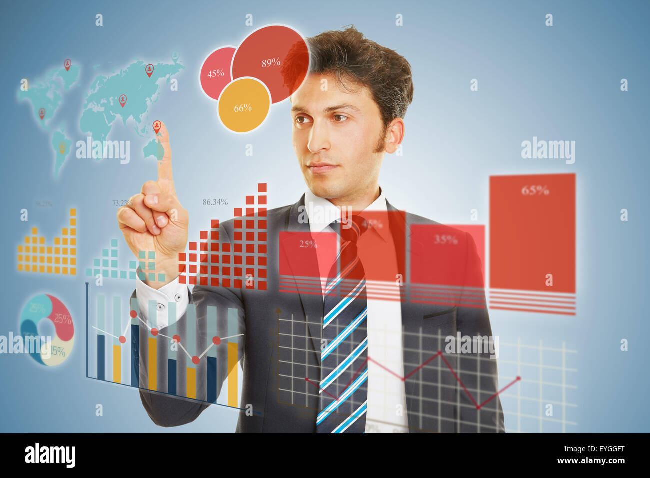 Business man doing financial planning with a huge touchscreen Stock ...