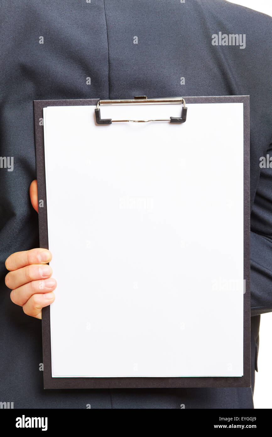 Hand of a business man holding clipboard with white paper behind his ...