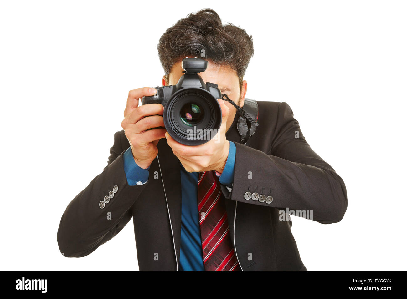Man in a suit photographing with modern DSLR camera Stock Photo - Alamy