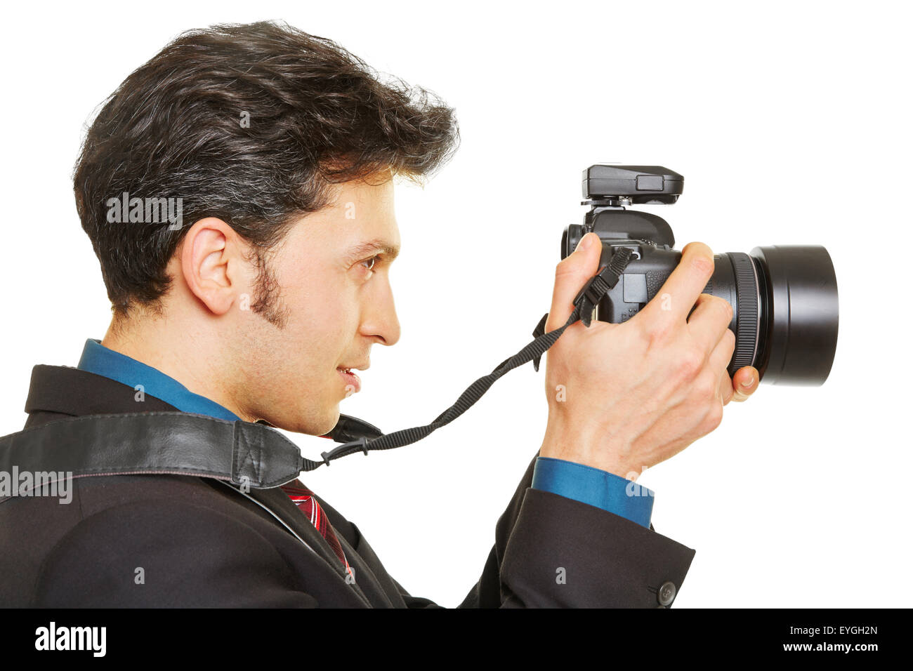Side view of photographer taking pictures with digital camera Stock ...