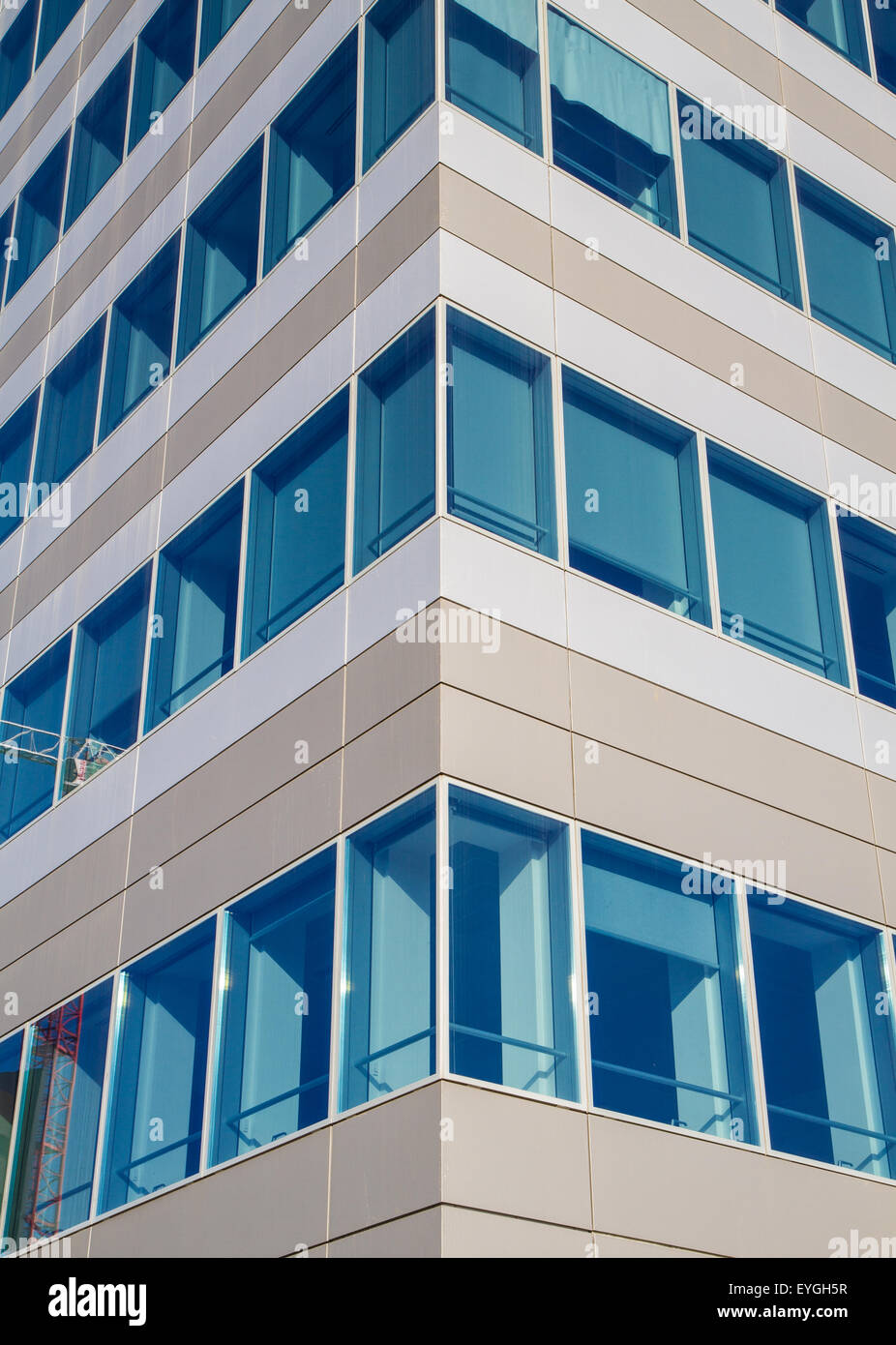 detail of a facade of a modern building with glass Stock Photo - Alamy