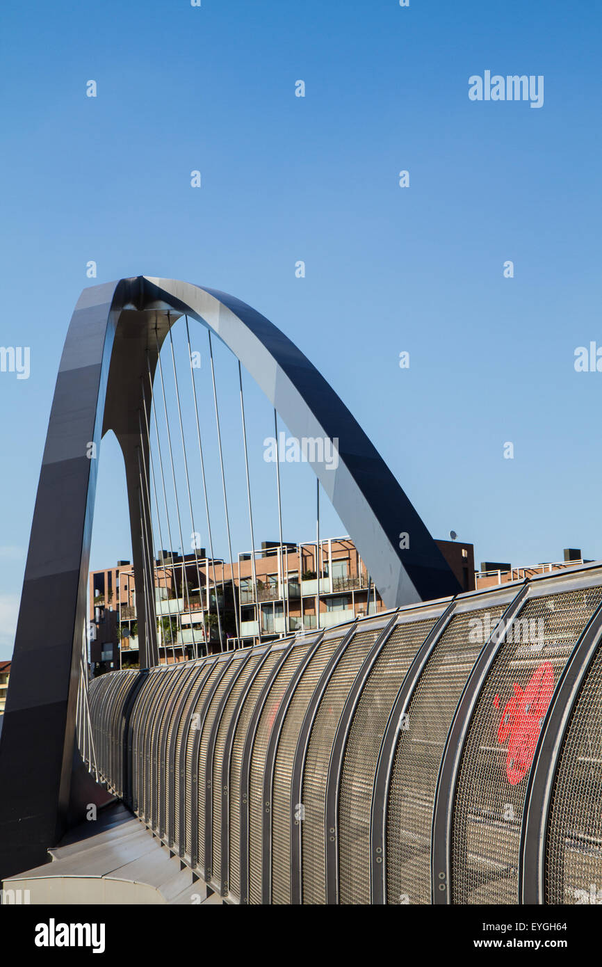 new modern footbridge with supporting arches and steel bulkheads Stock ...