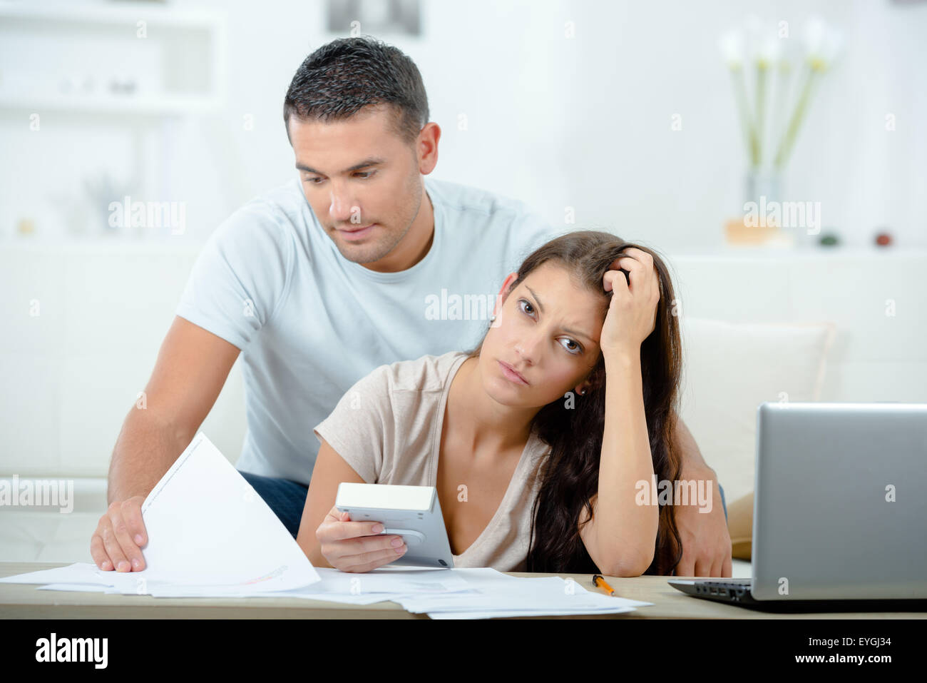 Pretty young woman calculator hi-res stock photography and images - Alamy