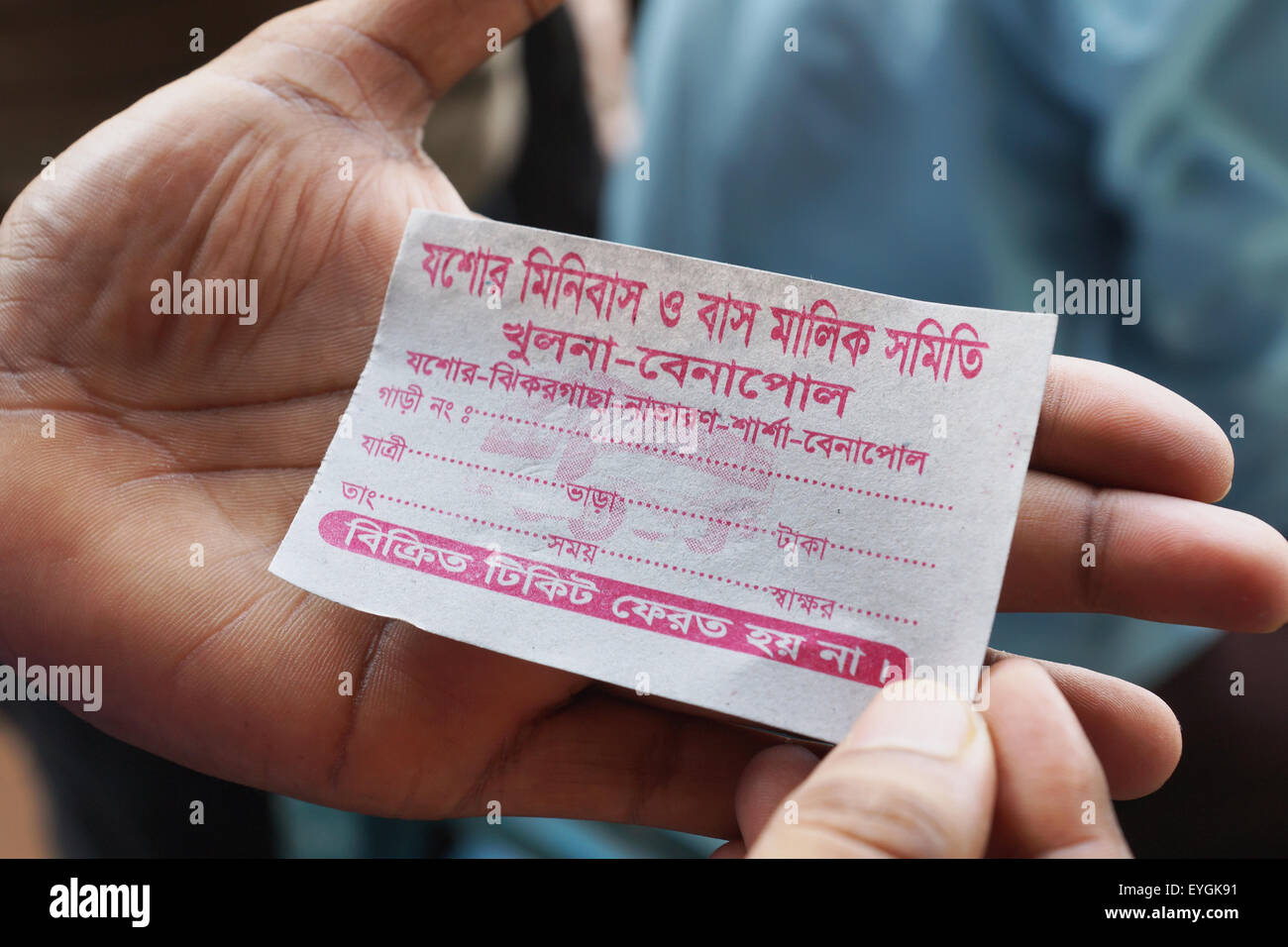 Passenger holding bus ticket; Bangladesh Stock Photo - Alamy