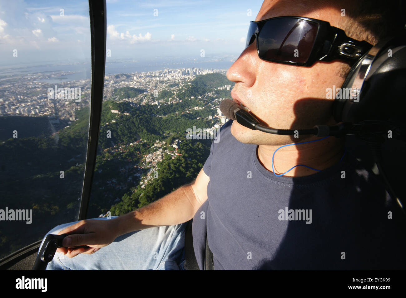 Man piloting helicopter over Rio de Janeiro; Brazil Stock Photo - Alamy