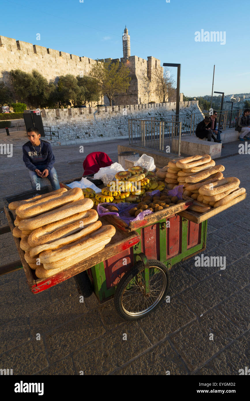 Israel, Jerusalem Old City, Youngster hawker selling bagel bread at ...