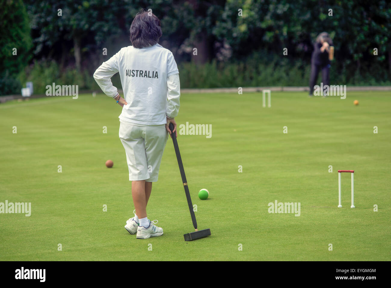 Three women play croquet hi-res stock photography and images - Alamy