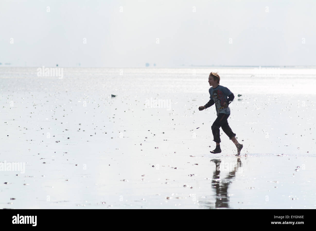 Running at the seaside hi-res stock photography and images - Alamy