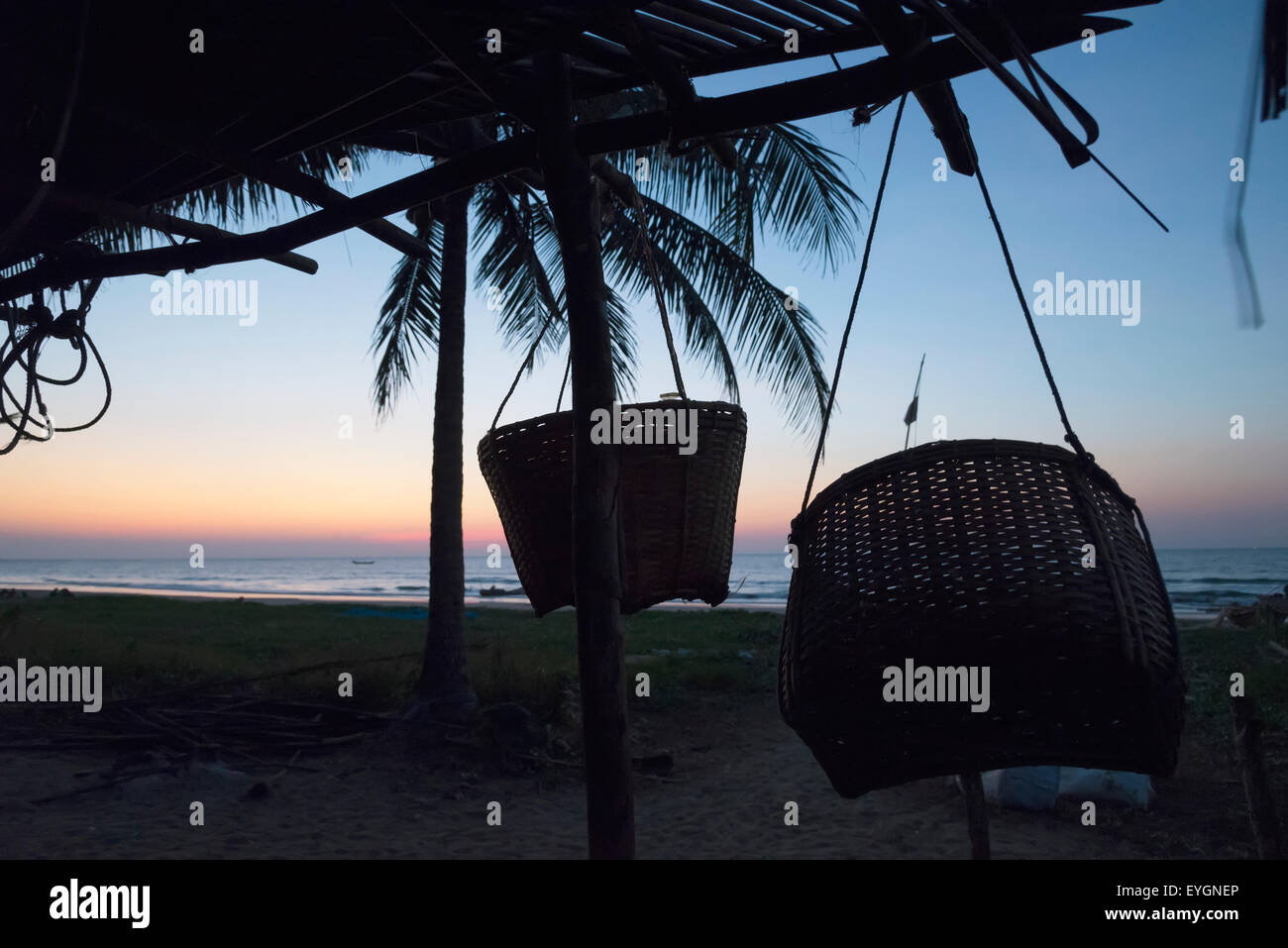 Myanmar (Burma), Irrawaddyi division, Fish panniers in bamboo hut on ...