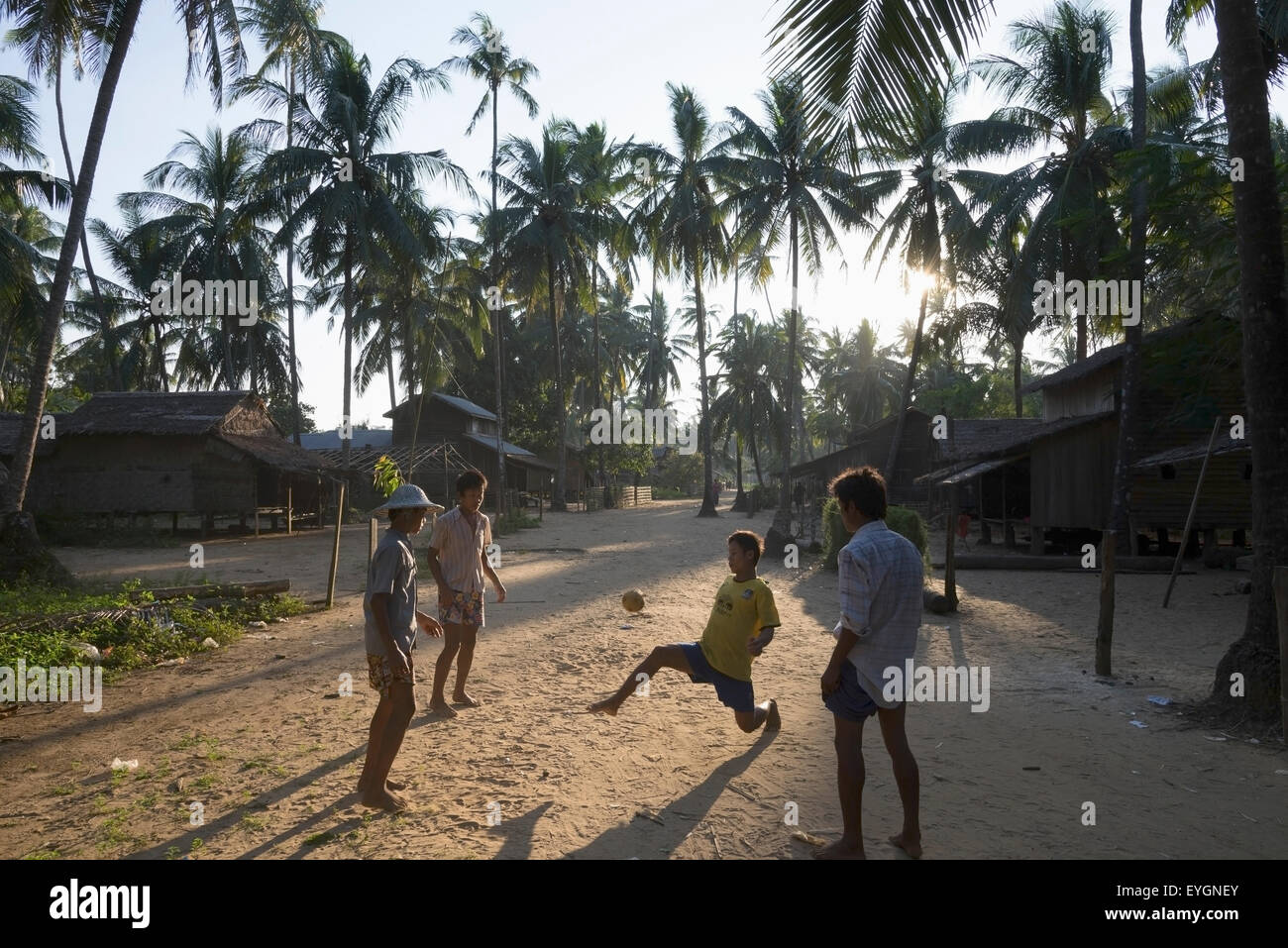 Myanmar (Burma), Young men playing with ball in streets of Yea Thoe ...