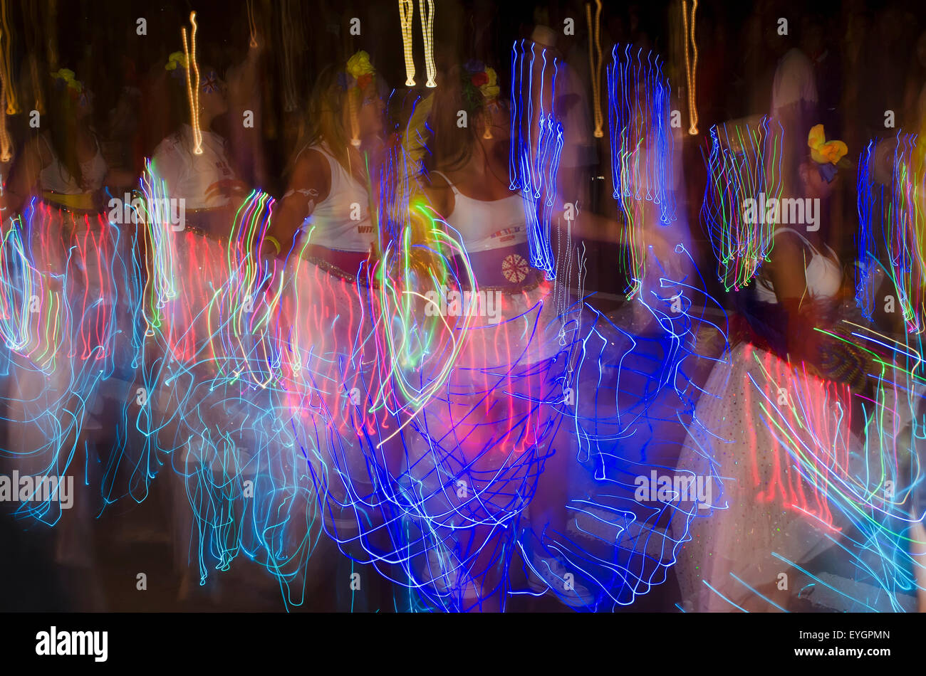 UK, Ladies parading and waving flash torch led wands; London Stock ...