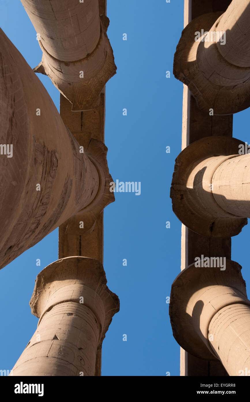 Columns in the setting sun at the temple in Luxor, Egypt Stock Photo ...