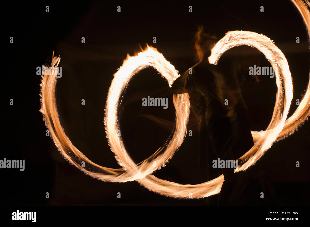 UK, Berkshire, Man juggling fire at night; Reading Stock Photo - Alamy