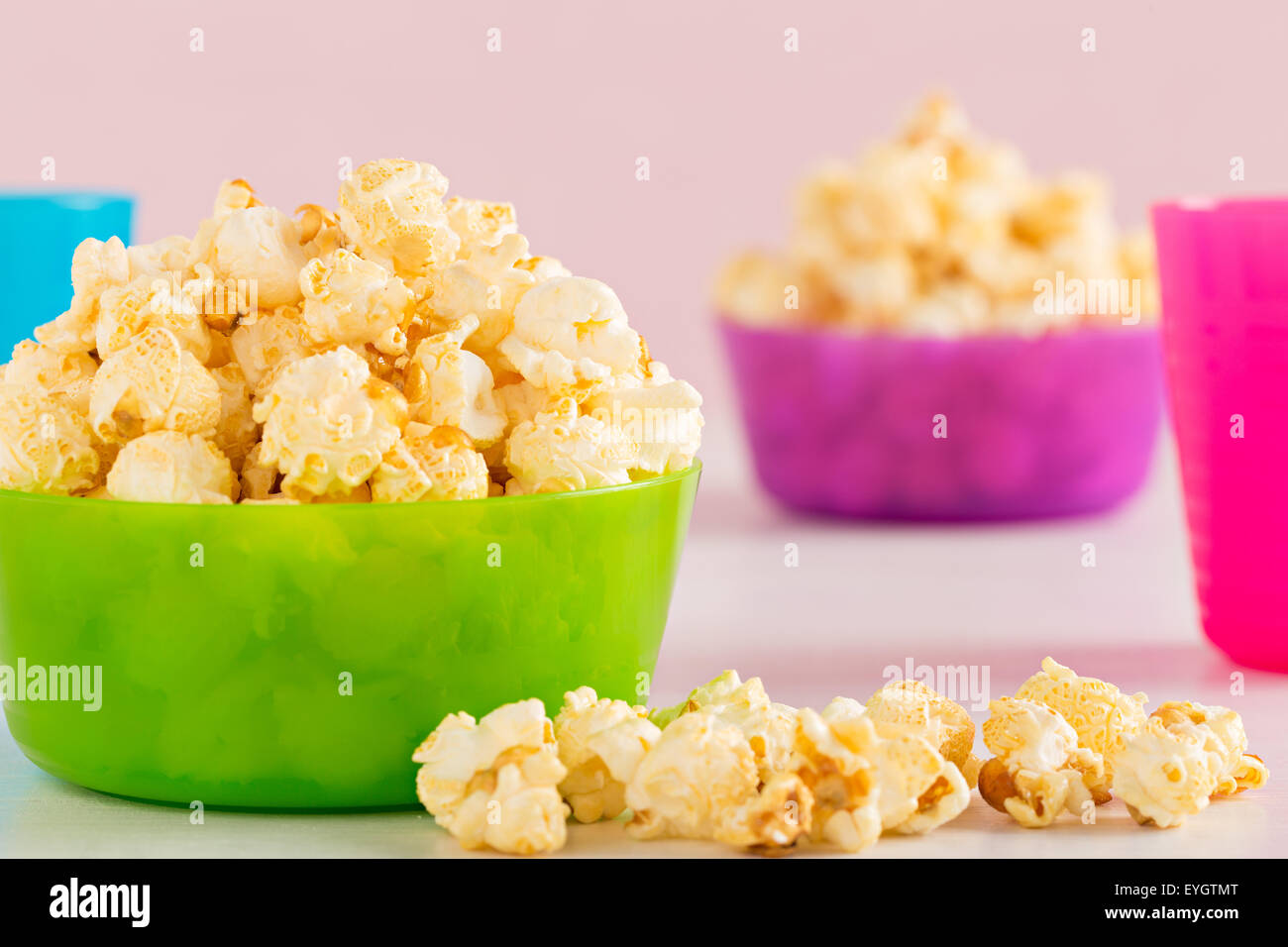 Popcorn in a colorful bowl Stock Photo - Alamy