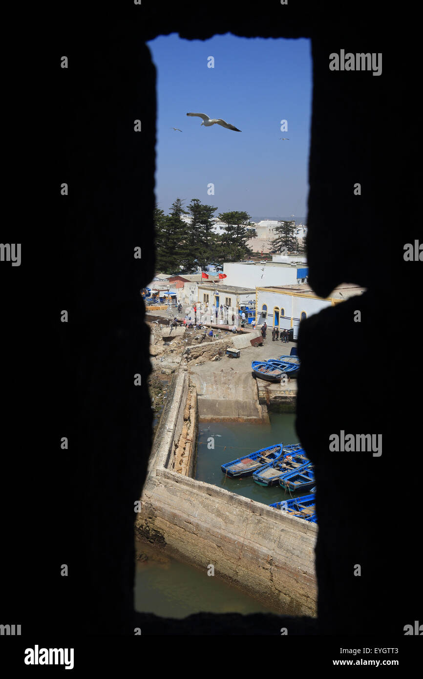 View of the harbour from the fortified tower in the port, at Skala de ...