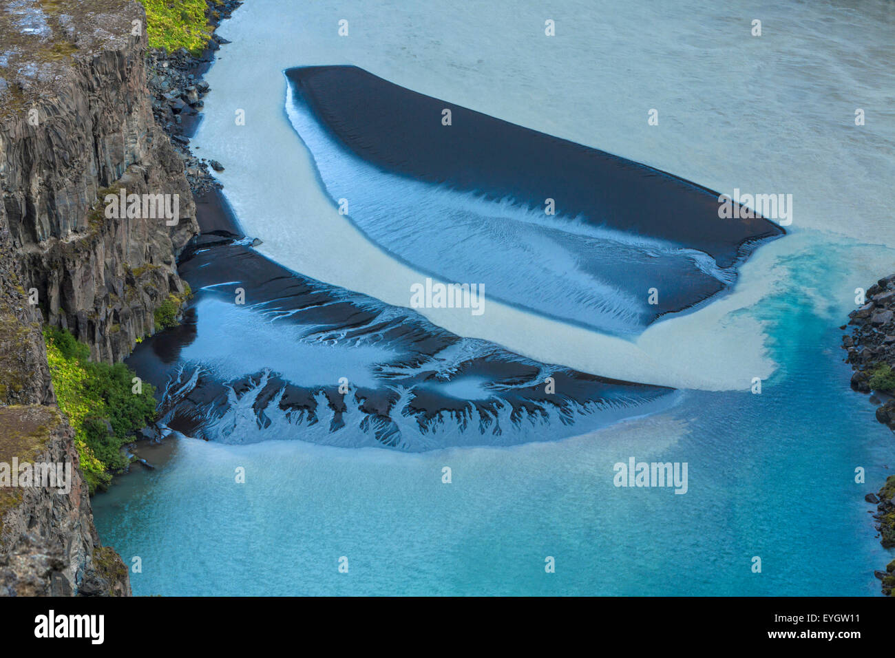Fractal structures created by sand and turquoise water on the river ...