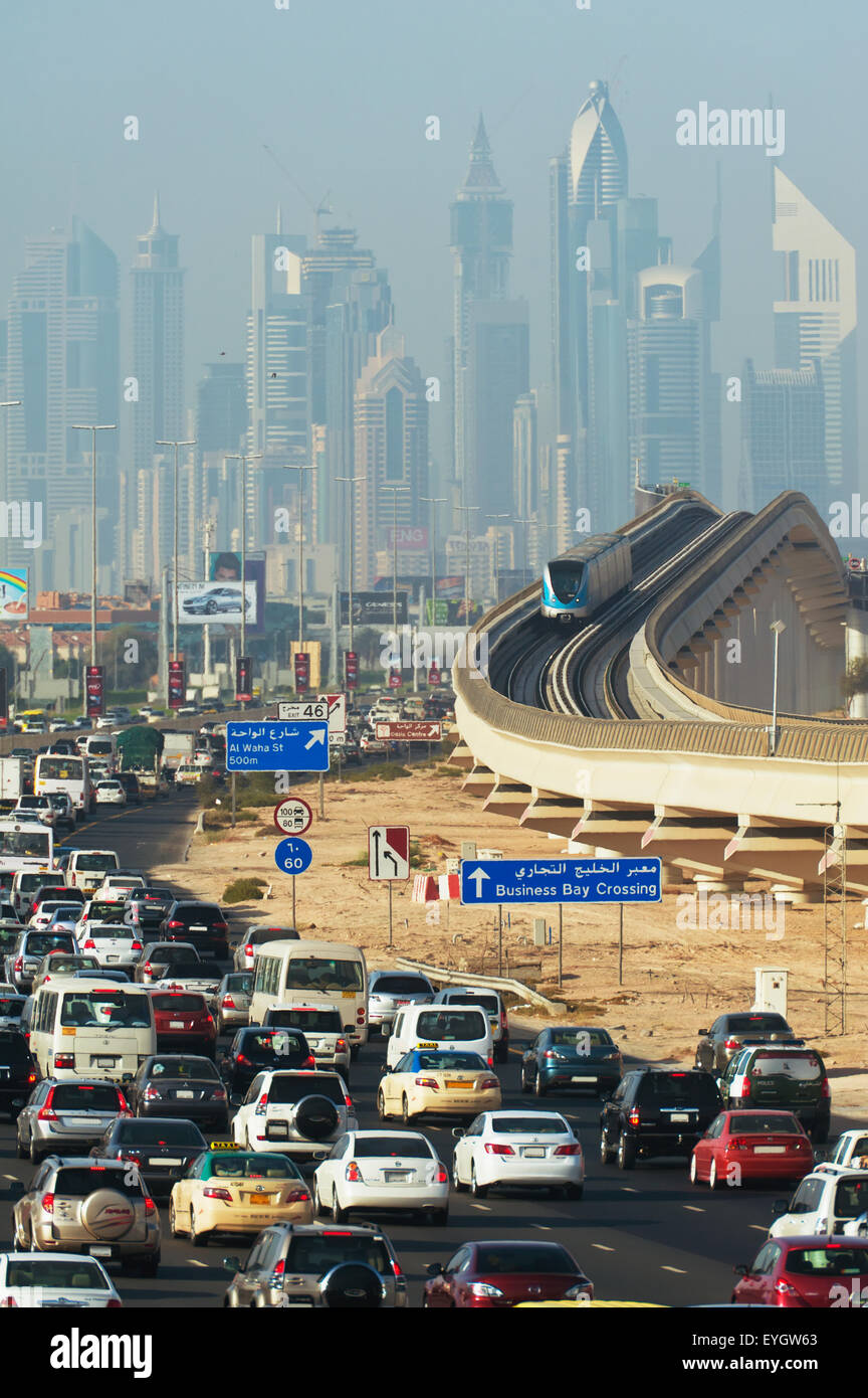 Subway Train Going Past Traffic; Sheikh Zayed Road, Dubai, United Arab ...