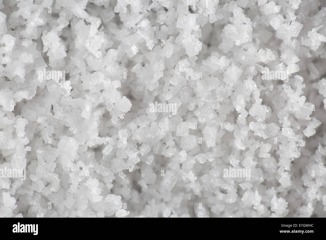 white sea salt crystals with dark background Stock Photo - Alamy