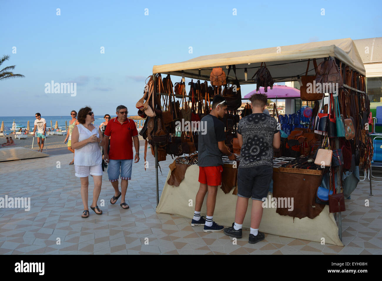 Stall selling leather goods set up for the night market on the Arenal ...