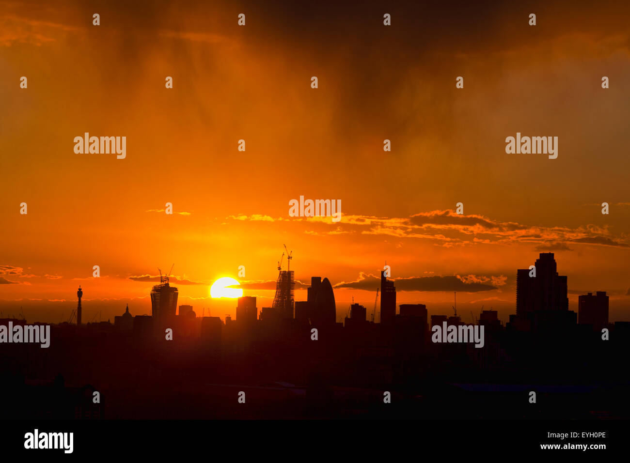 City Of London Skyline With Setting Sun; London, England, Uk Stock ...