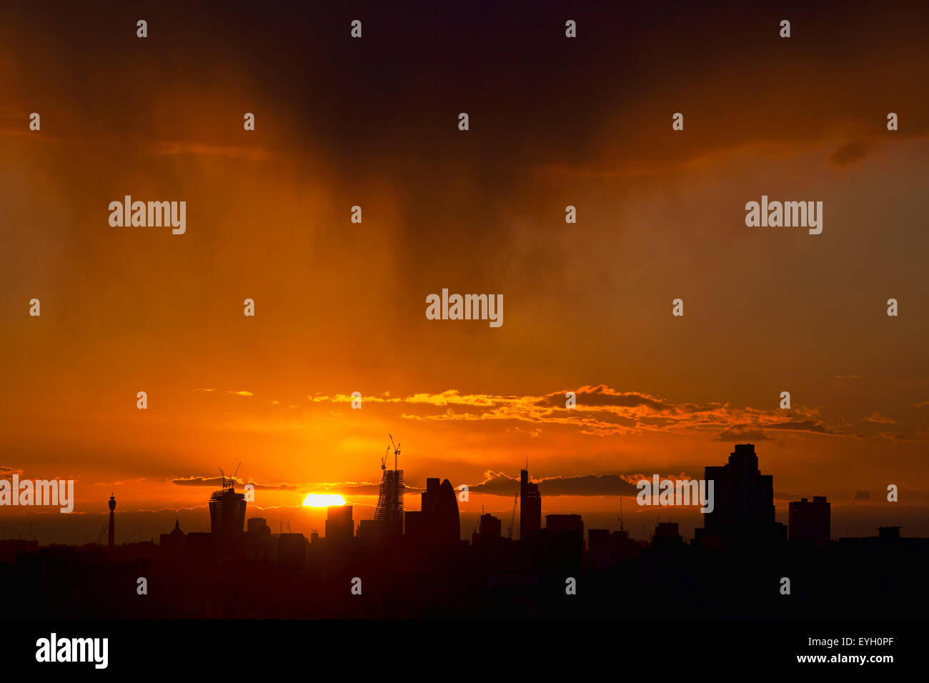 City Of London Skyline With Setting Sun; London, England, Uk Stock ...