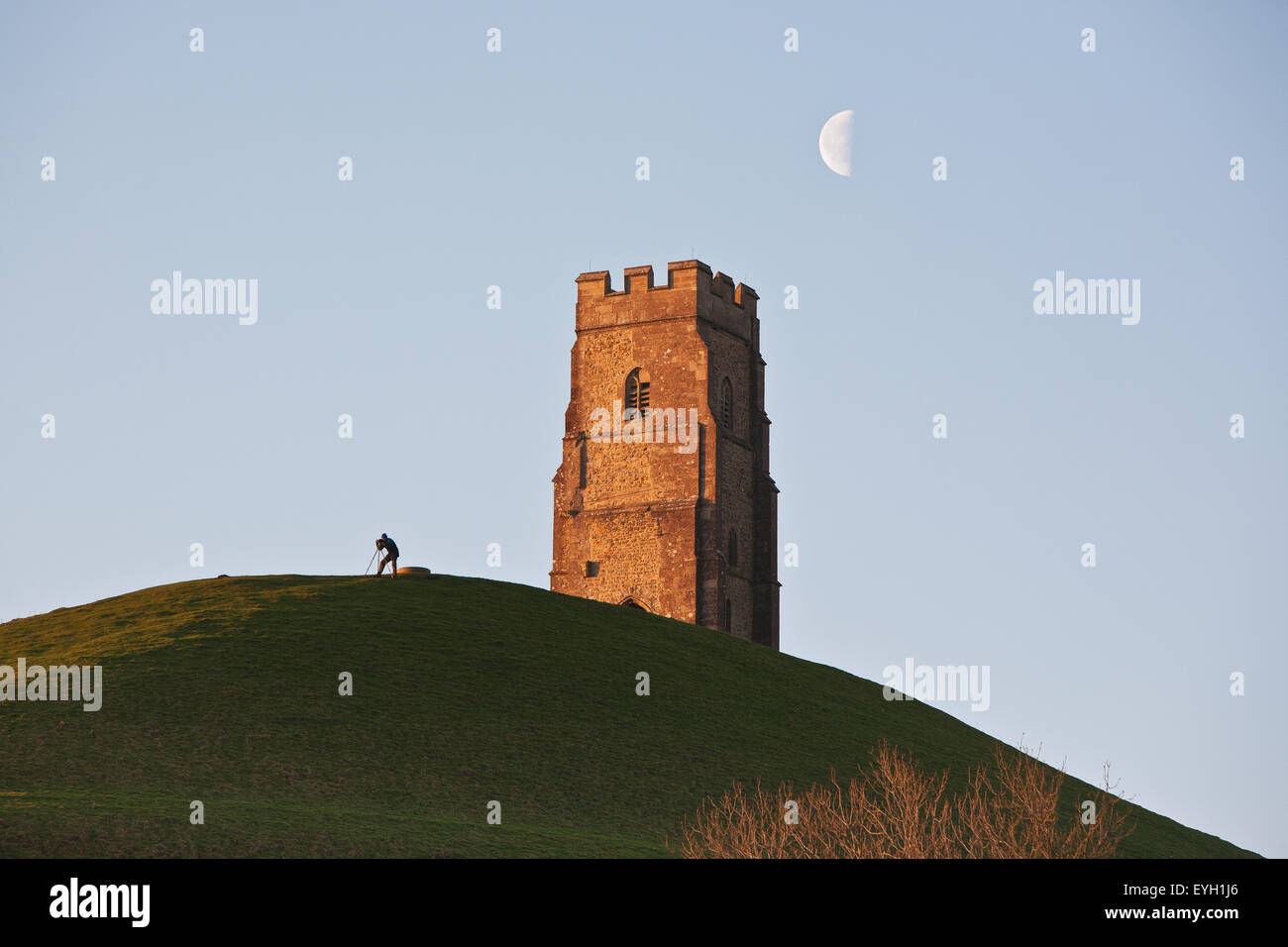 Man Watching Moon With A Telescope Near Tower; Glastonbury,Somerset ...