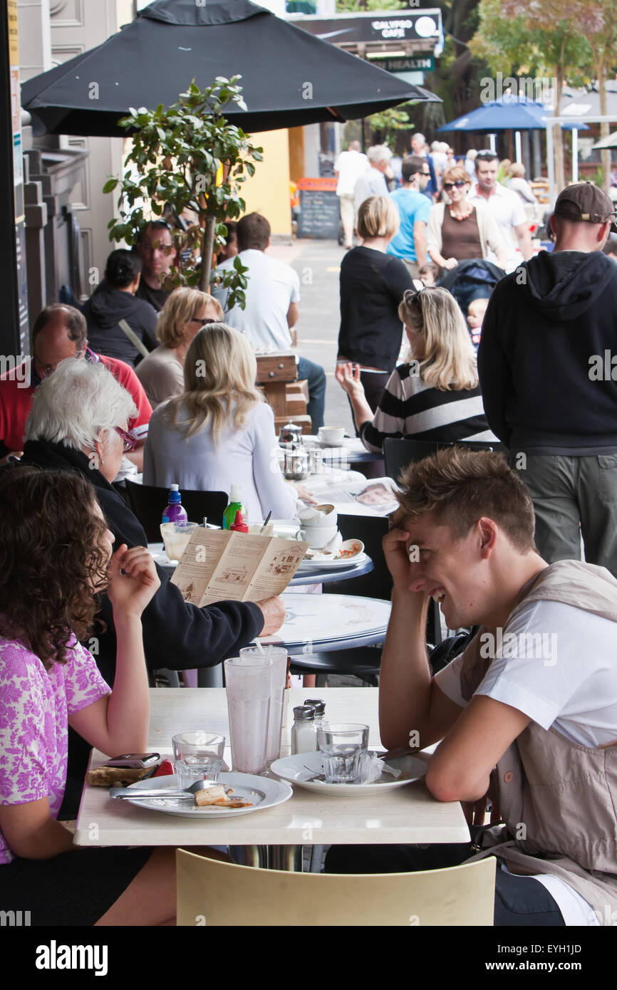 People Sitting In Sidewalk Cafe; New Zealand Stock Photo - Alamy